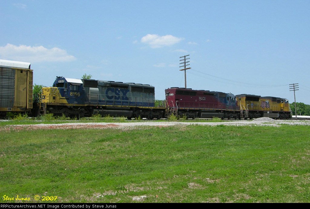 UP 3833,HLCX 6514,CSX 8156 Q210